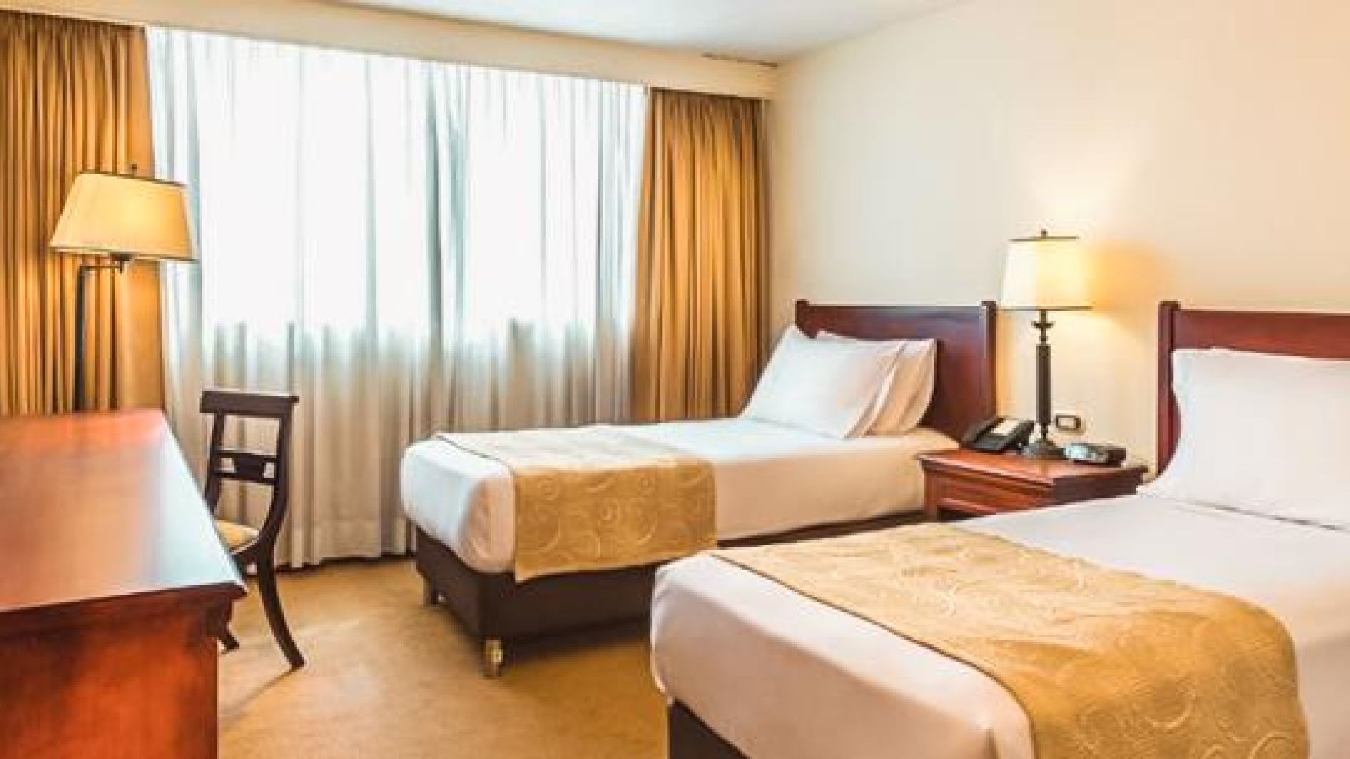 Hotel Dann Av. 19 - Bogota Habitaciones de uso diurno | HotelsByDay.com
